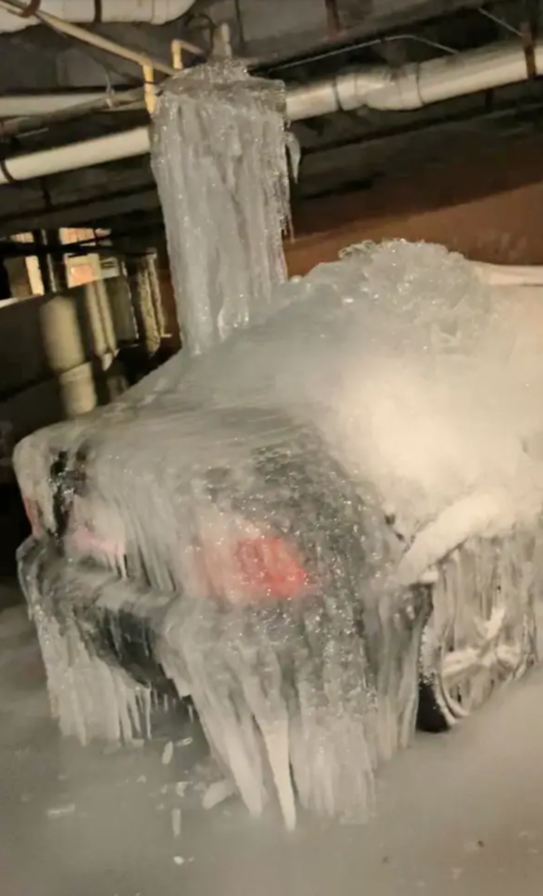 Woman Shows Car Trapped In Block Of Ice In Texas Parking Garage